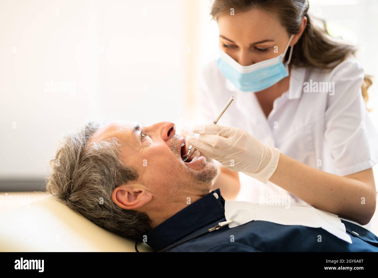 Dental Checkup And Dentistry Care By Dentist Stock Photo - Alamy