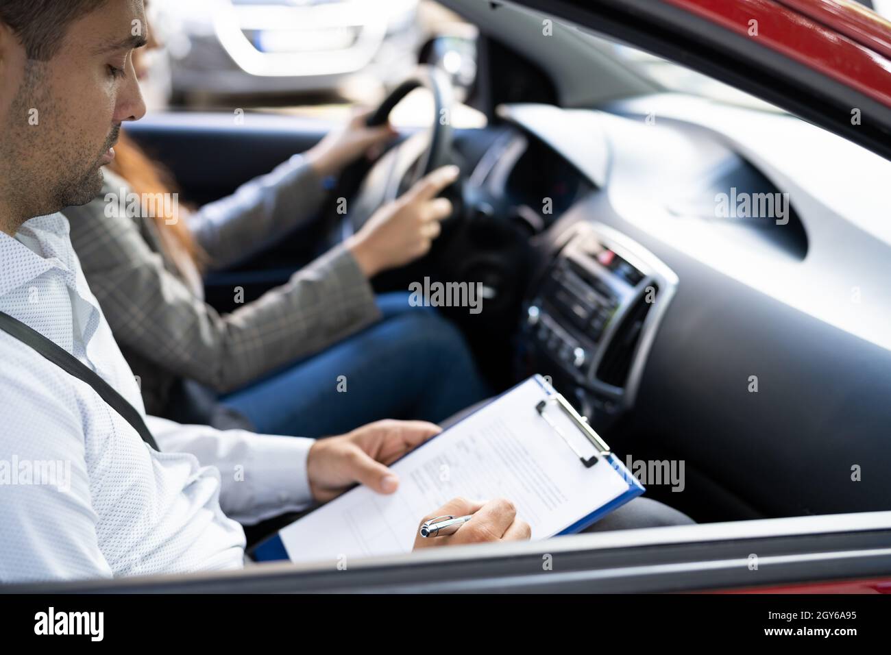Driving License Lesson Or Test With Instructor Stock Photo - Alamy