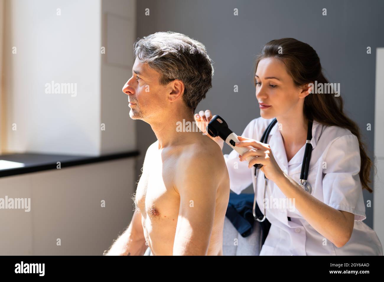 Dermatologist Checking Skin Allergy And Pigment Problems Stock Photo ...