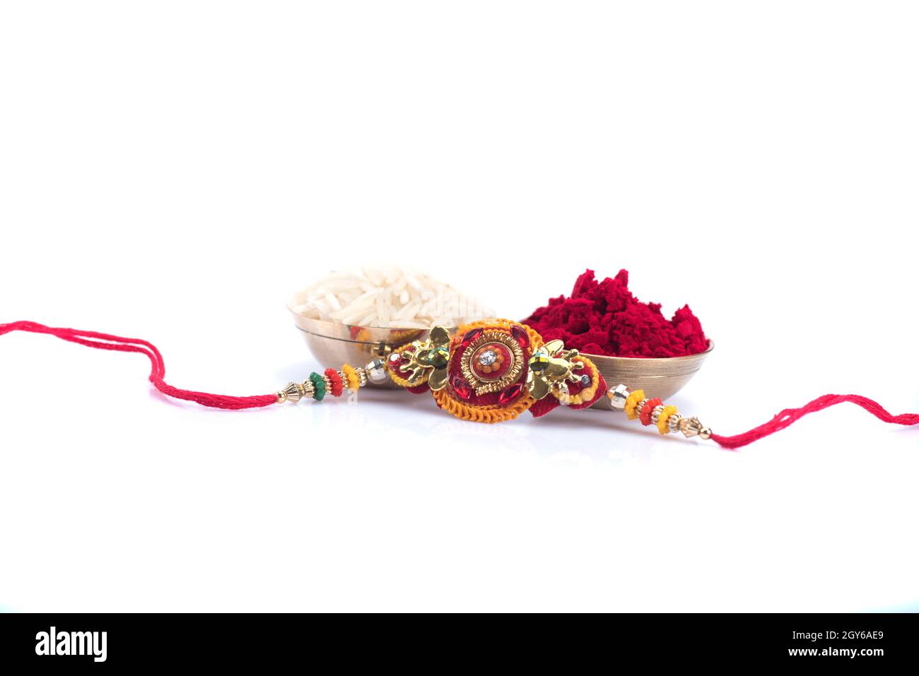 Indian festival: Raksha Bandhan background with an elegant Rakhi on a ...