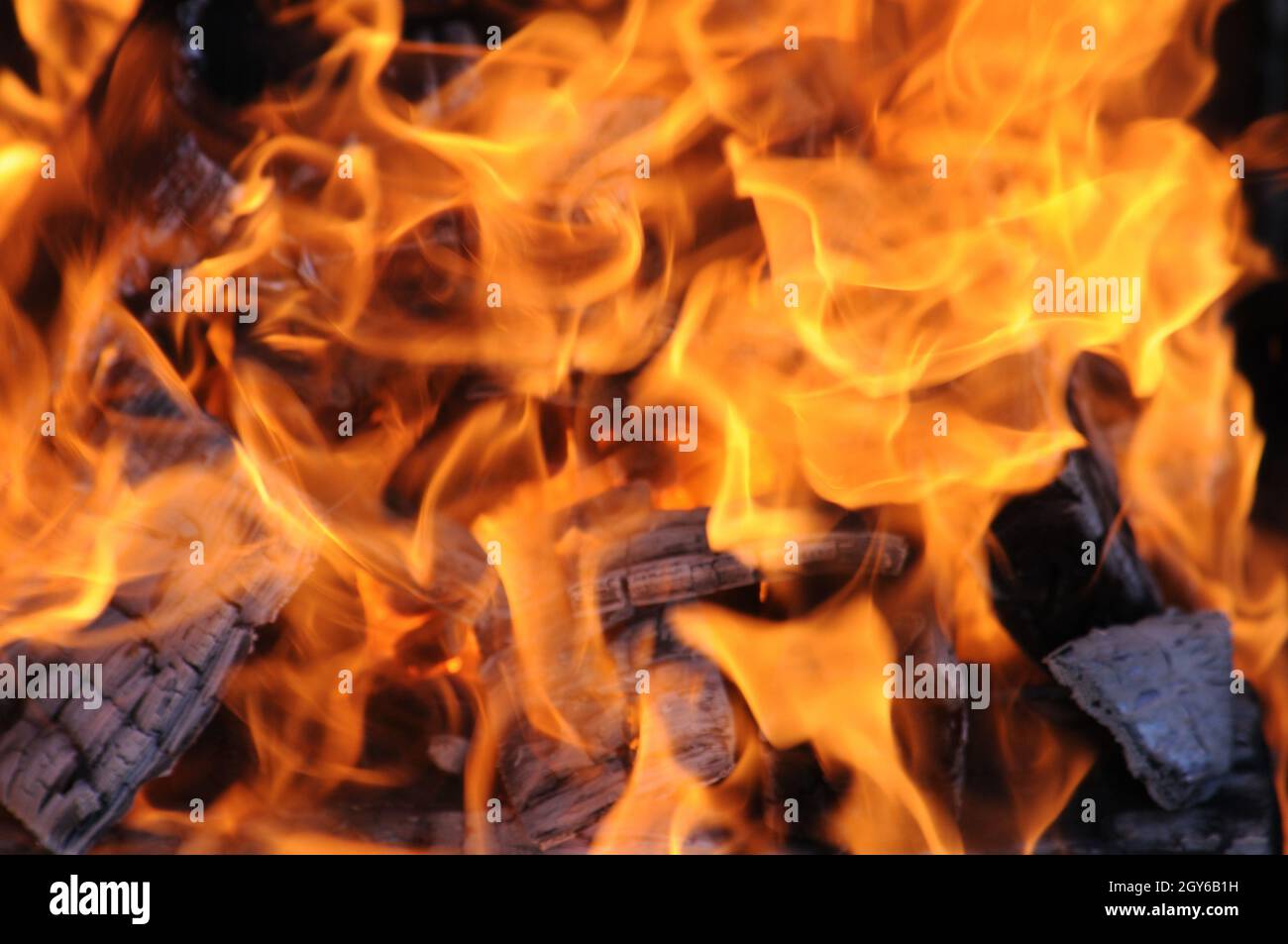 Campfire fire kindled in a camping trip Stock Photo - Alamy