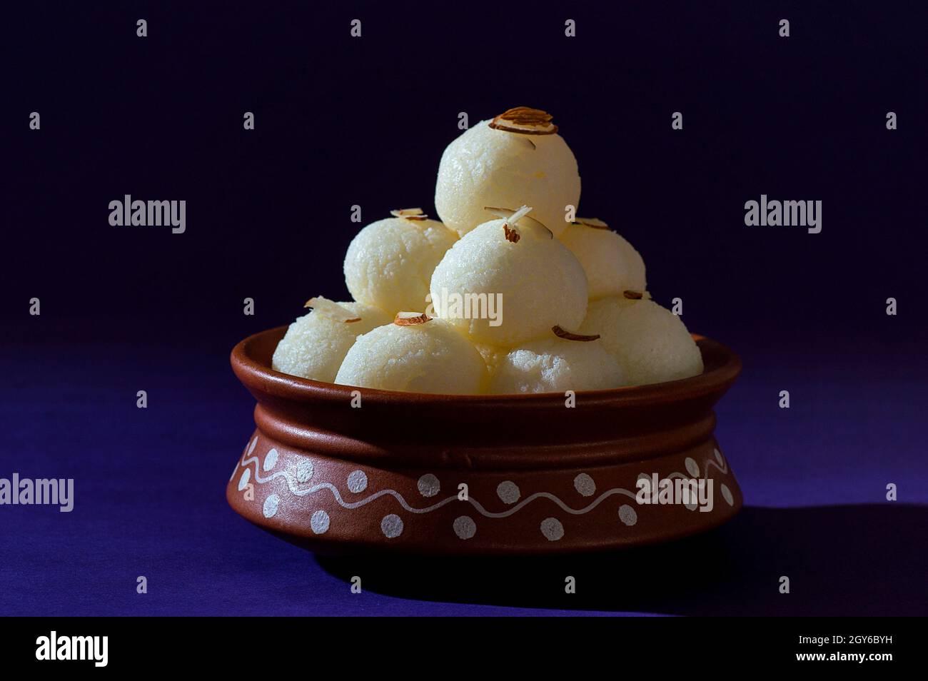 ndian Sweet or Dessert - Rasgulla in clay pot Stock Photo - Alamy