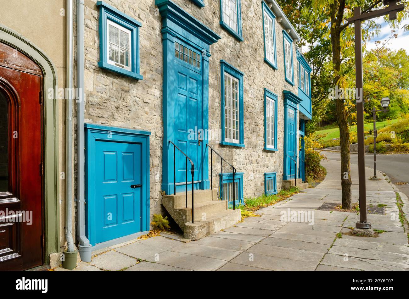 Stone buildings of Townhouse with blue shutters, typical of Old Town ...