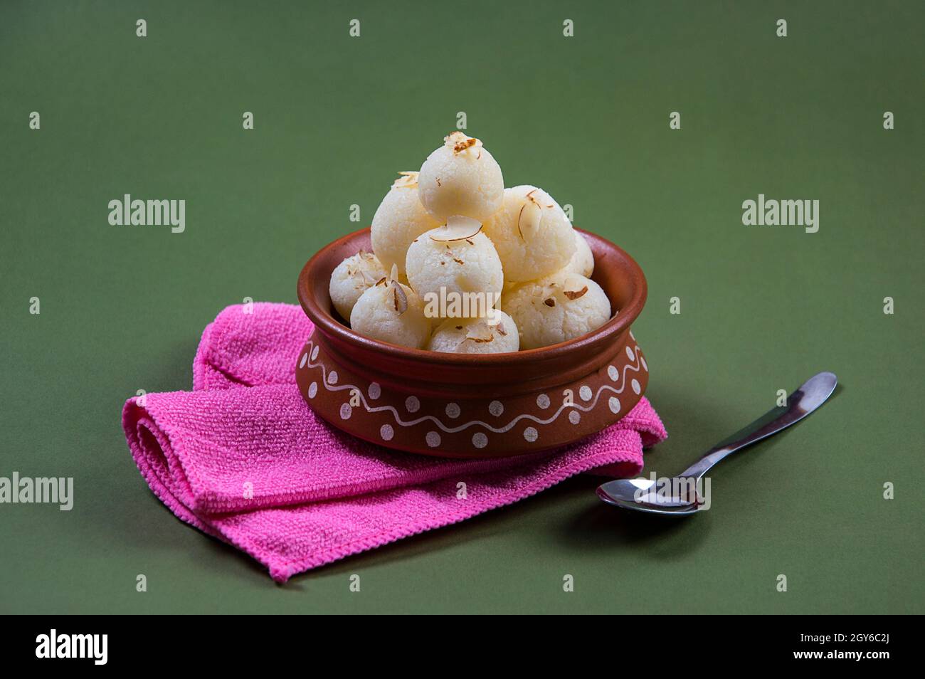 Indian Sweet - Rasgulla, Famous Bengali sweet in clay bowl with napkin ...