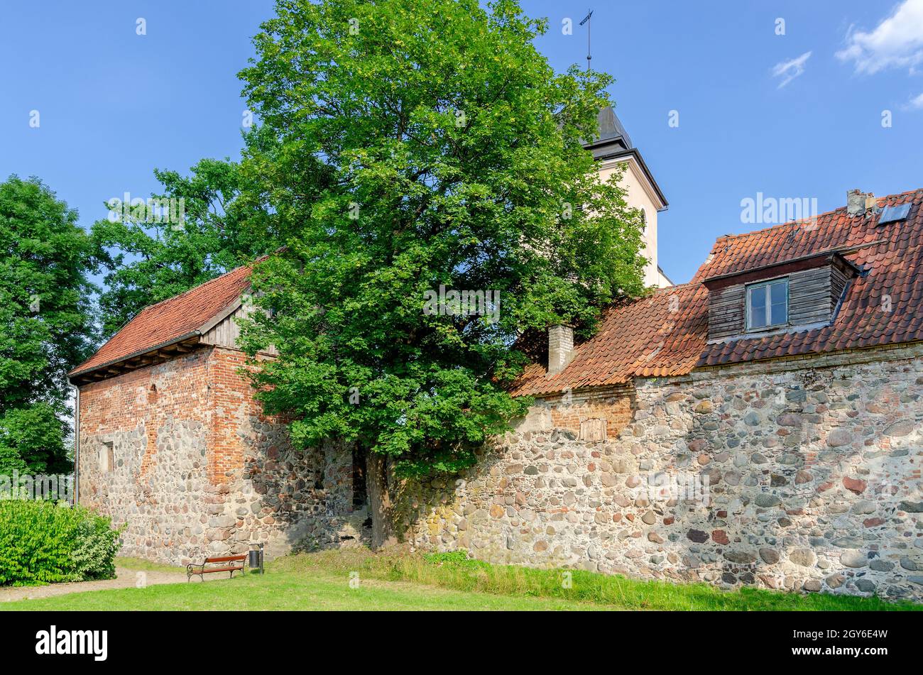 The medieval defensive walls. Mrongovius house at the left. Olsztynek ...