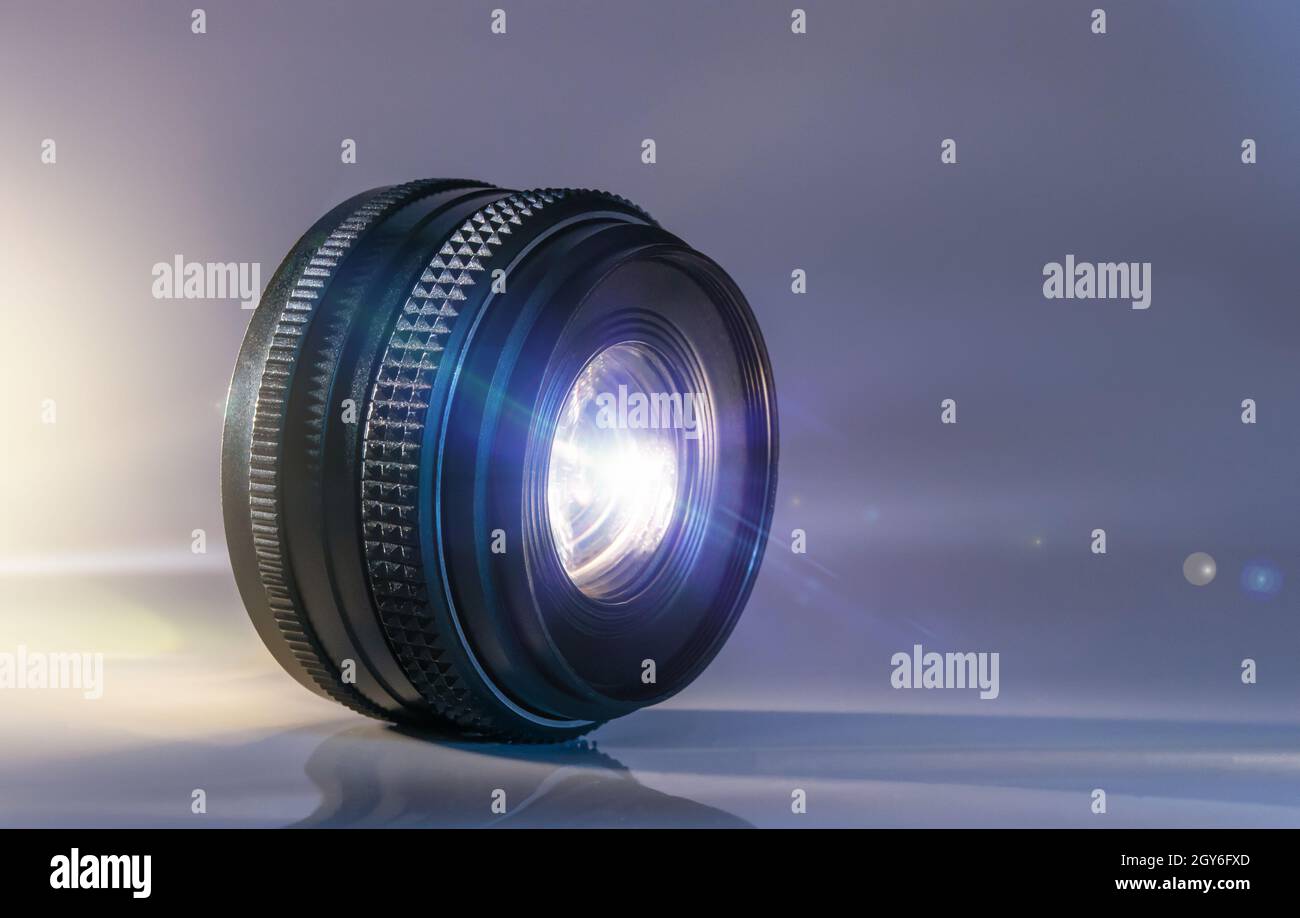 photo lens on white background with reflection and light beam Stock ...