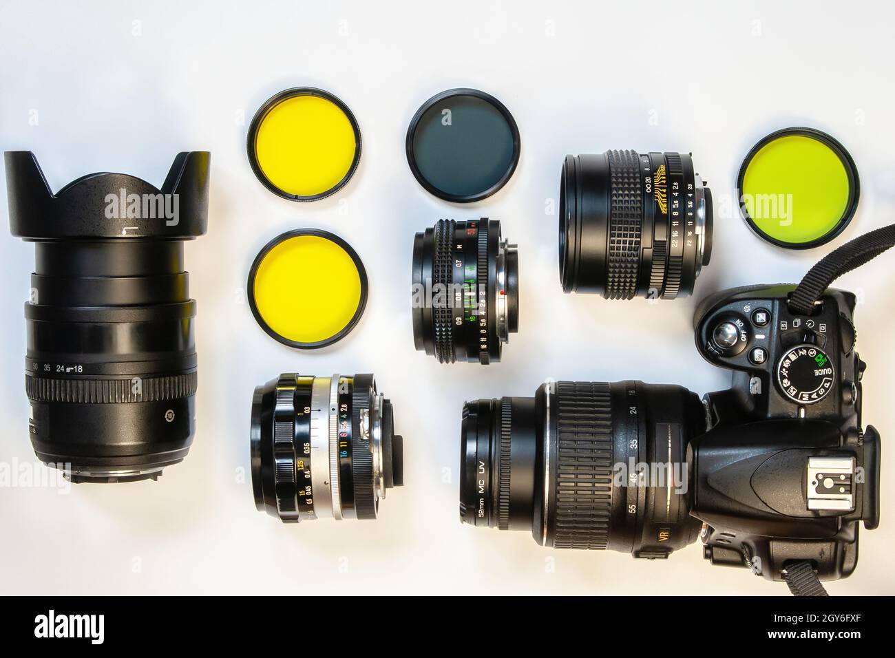camera, set of photo lens and color optical filters on white background ...