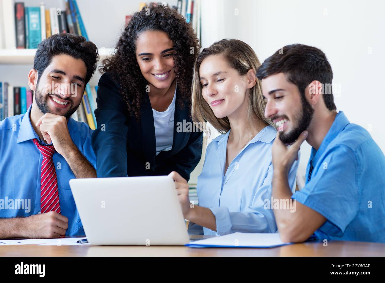 International group of software engineers and programmers at computer ...