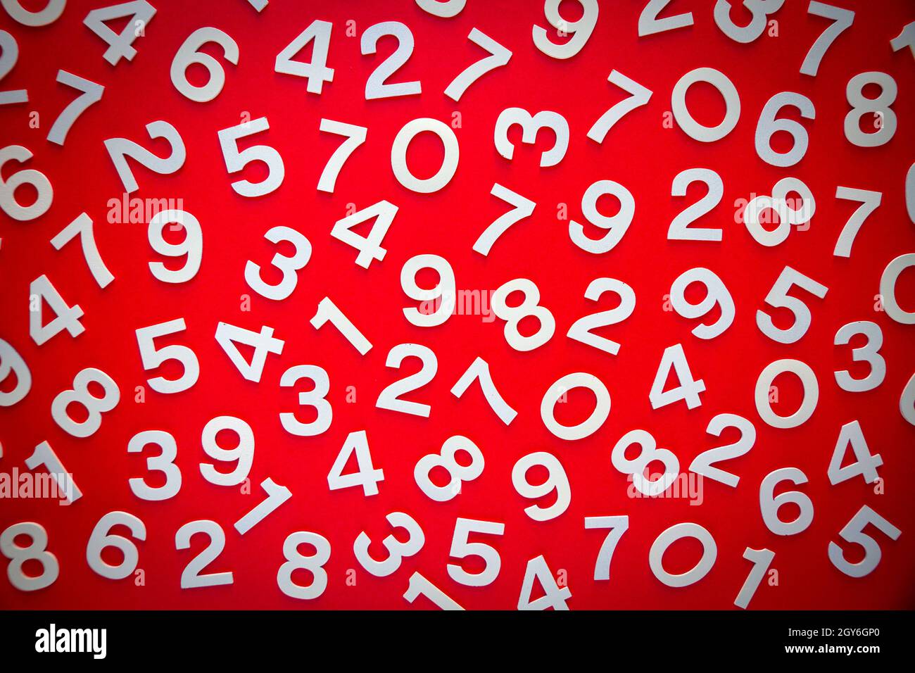Mathematics background made with solid numbers on a board. Top view ...