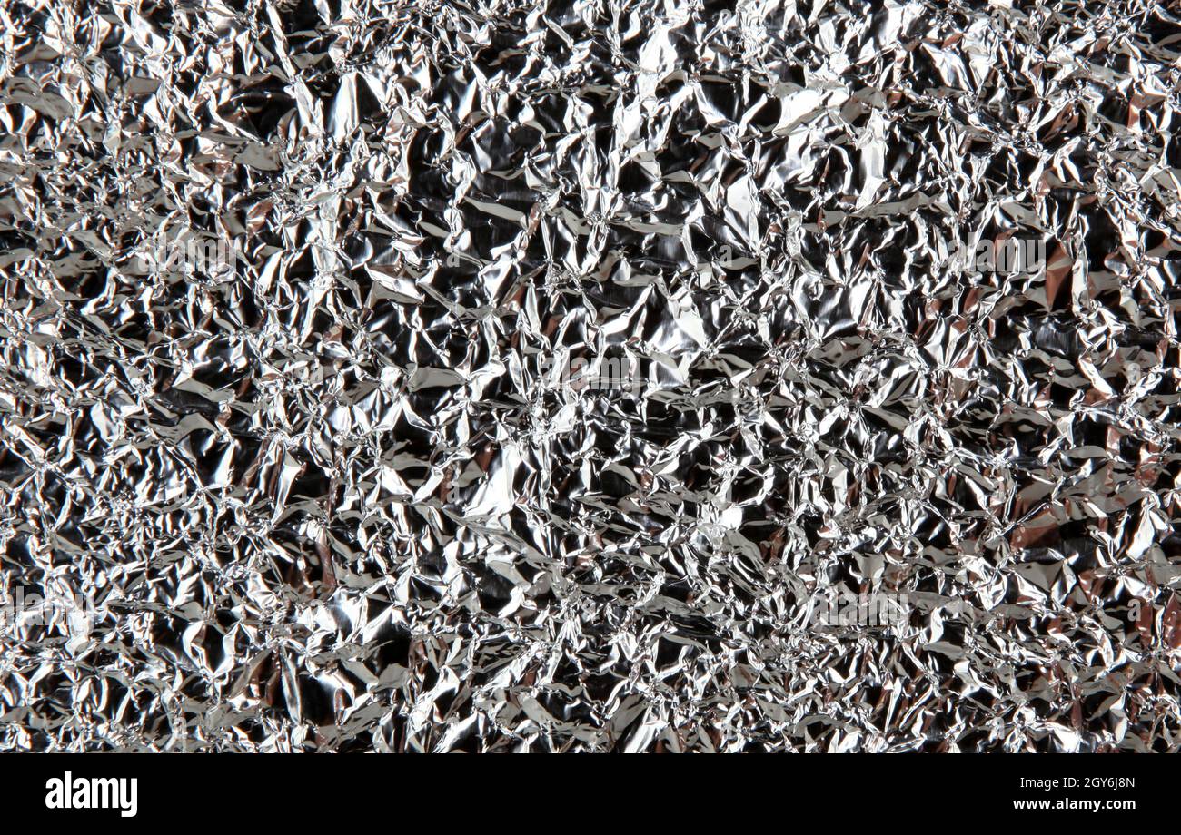silver rough wrinkle foil texture Stock Photo - Alamy