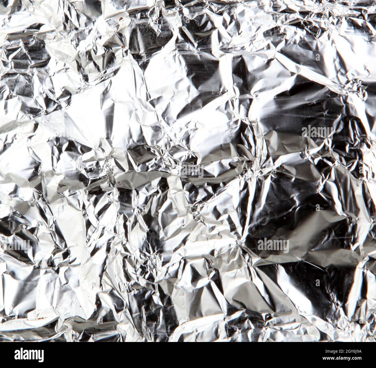 silver rough wrinkle foil texture Stock Photo - Alamy