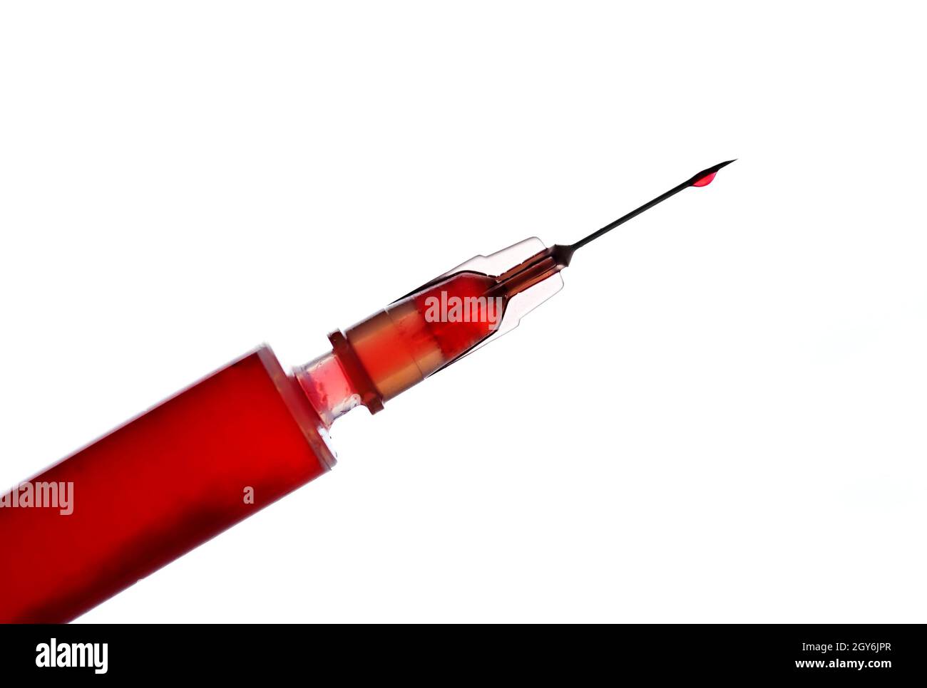 Syringe with red liquid isolated on white Stock Photo - Alamy