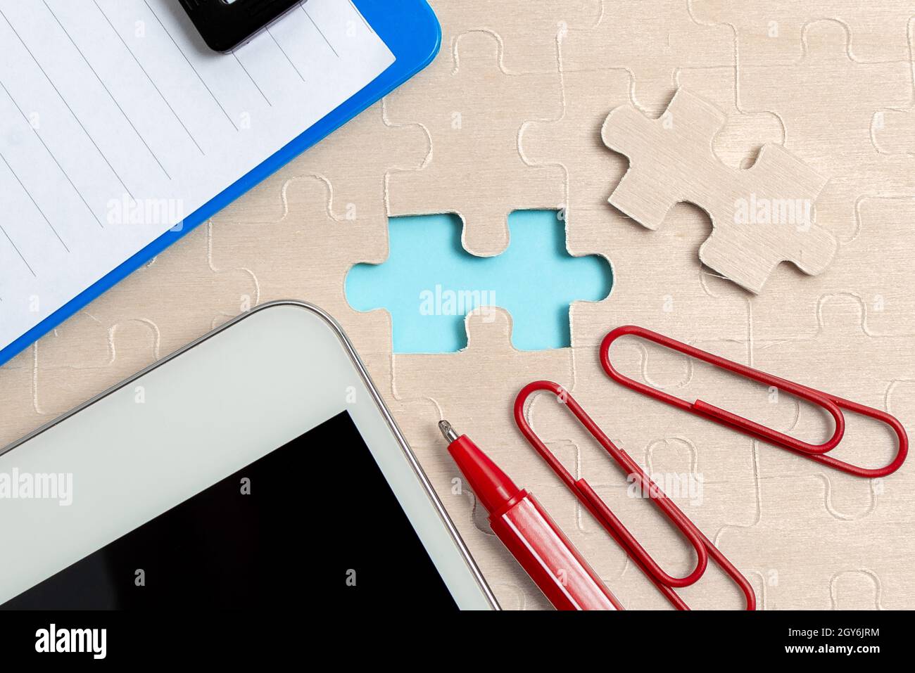 Building An Unfinished White Jigsaw Pattern Puzzle With Missing Last ...