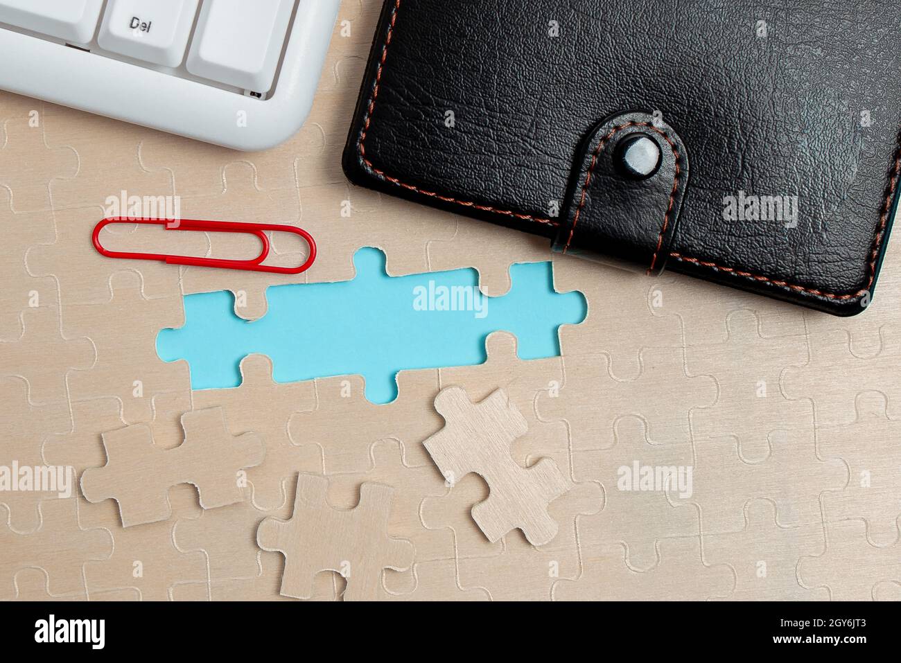 Building An Unfinished White Jigsaw Pattern Puzzle With Missing Last ...