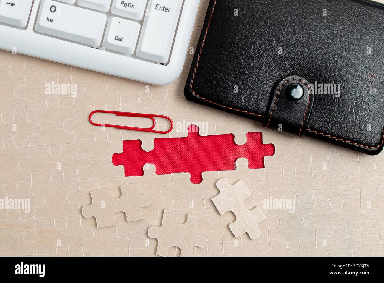 Building An Unfinished White Jigsaw Pattern Puzzle With Missing Last ...