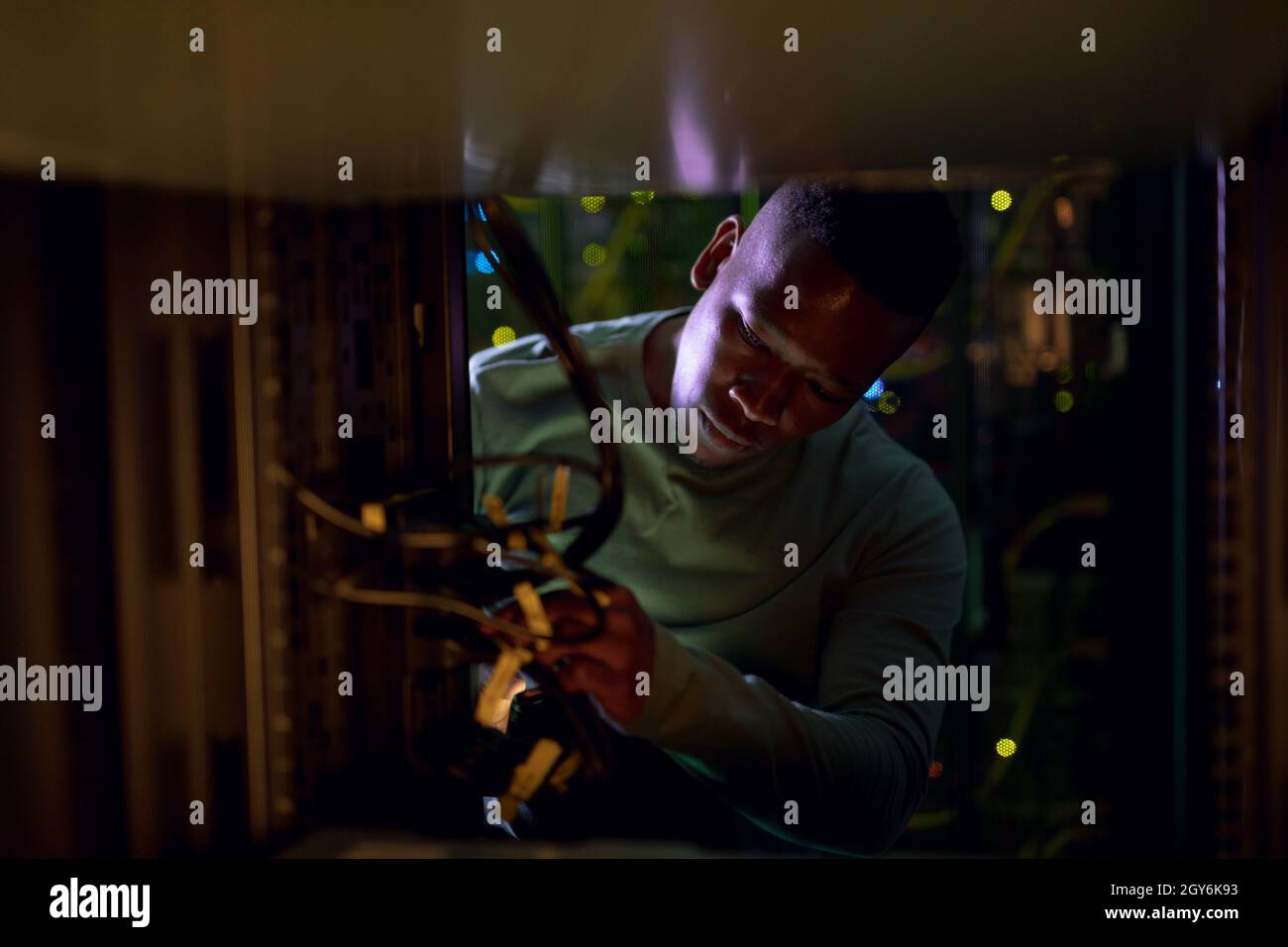 African american male computer technician working in server room Stock ...