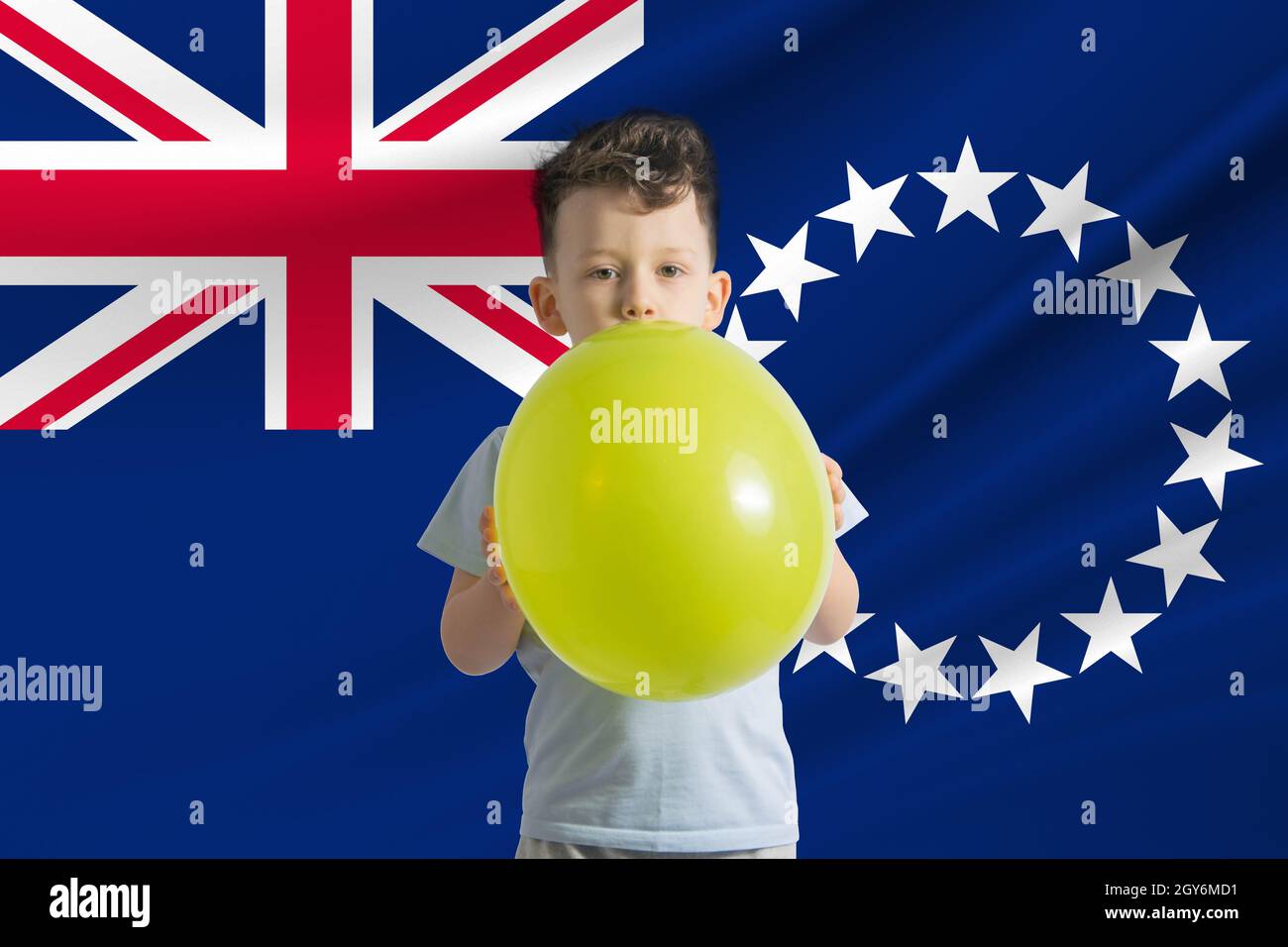 Children's day in Cook Islands. White boy with a balloon on the ...