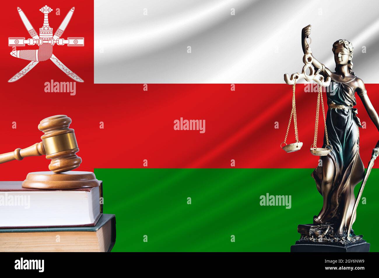 Law and justice in Oman. Statue of themis and the gavel of the judge ...
