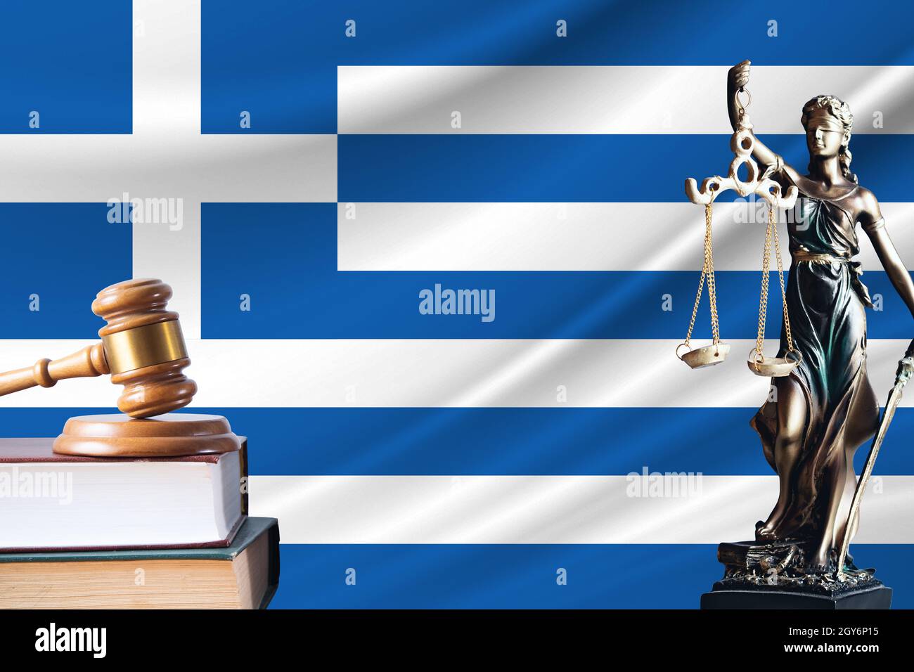 Law and justice in Greece. Statue of themis and the gavel of the judge ...