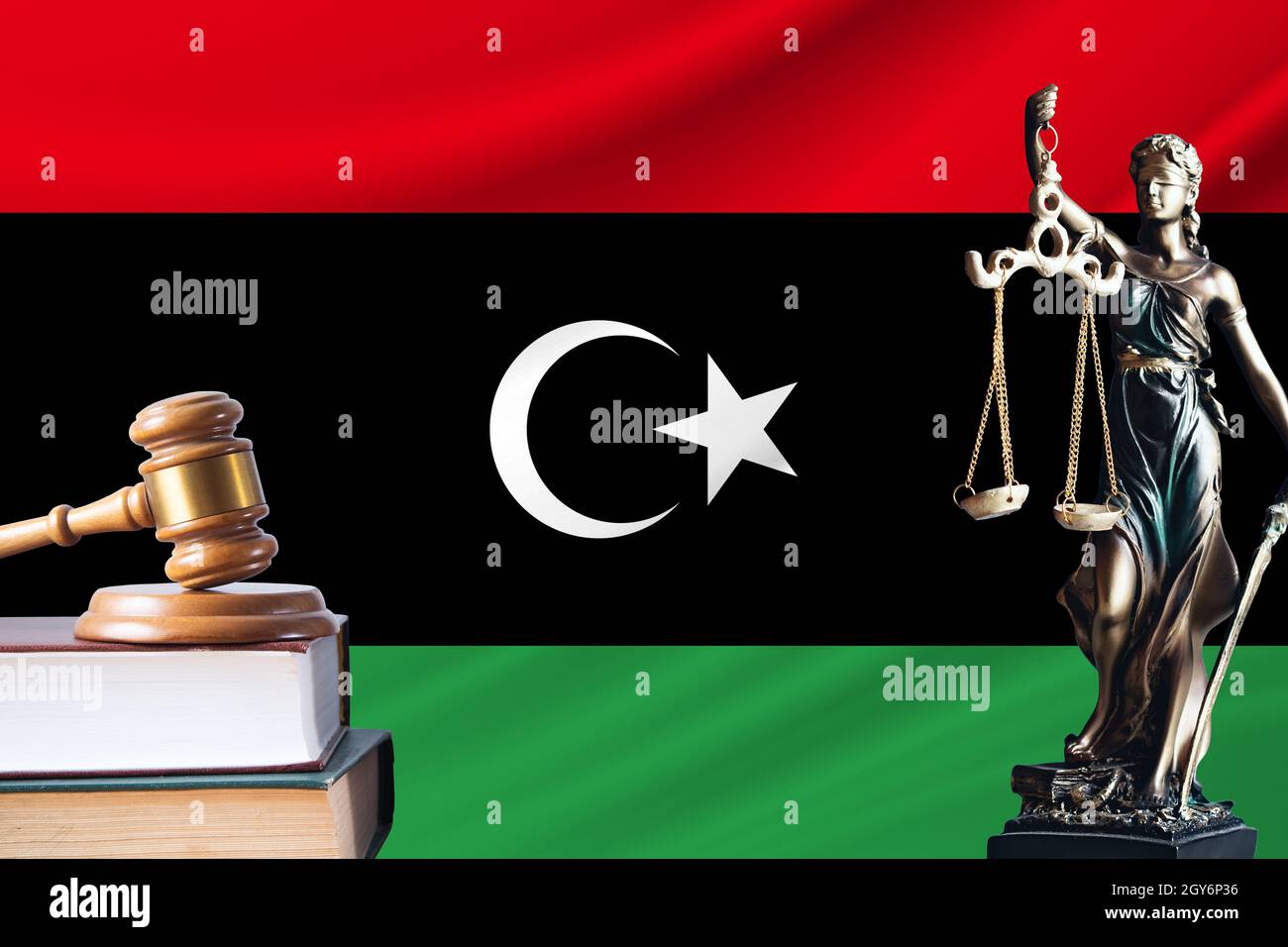 Law and justice in Libya. Statue of themis and the gavel of the judge ...