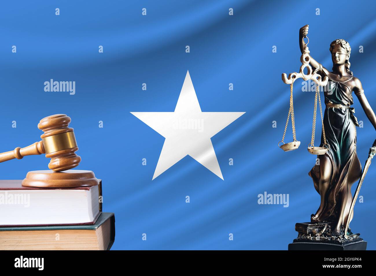 Law and justice in Somalia. Statue of themis and the gavel of the judge ...