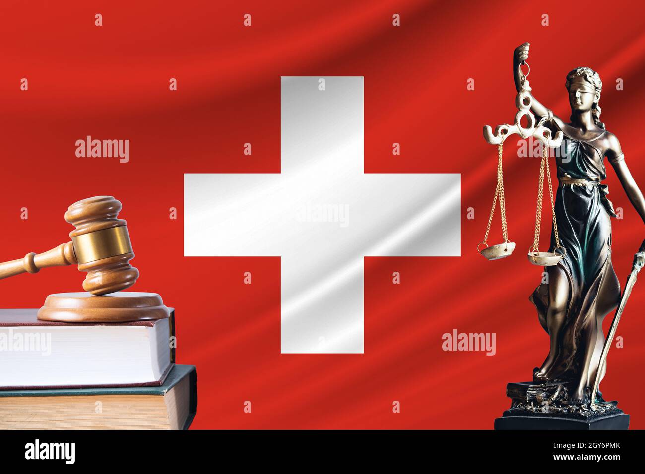 Law and justice in Switzerland. Statue of themis and the gavel of the ...