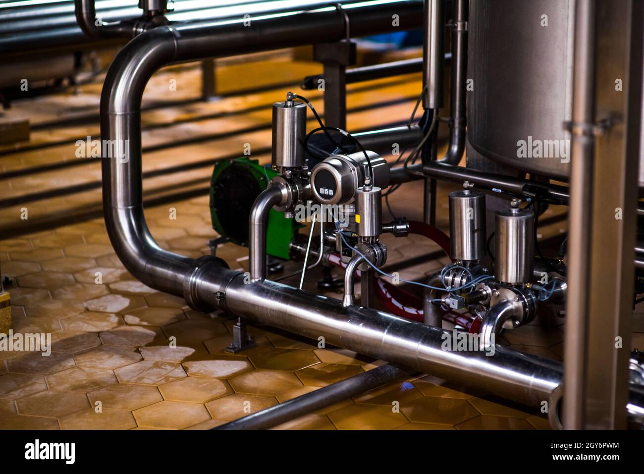Stainless steel pipes in the factory. Construction on food production ...