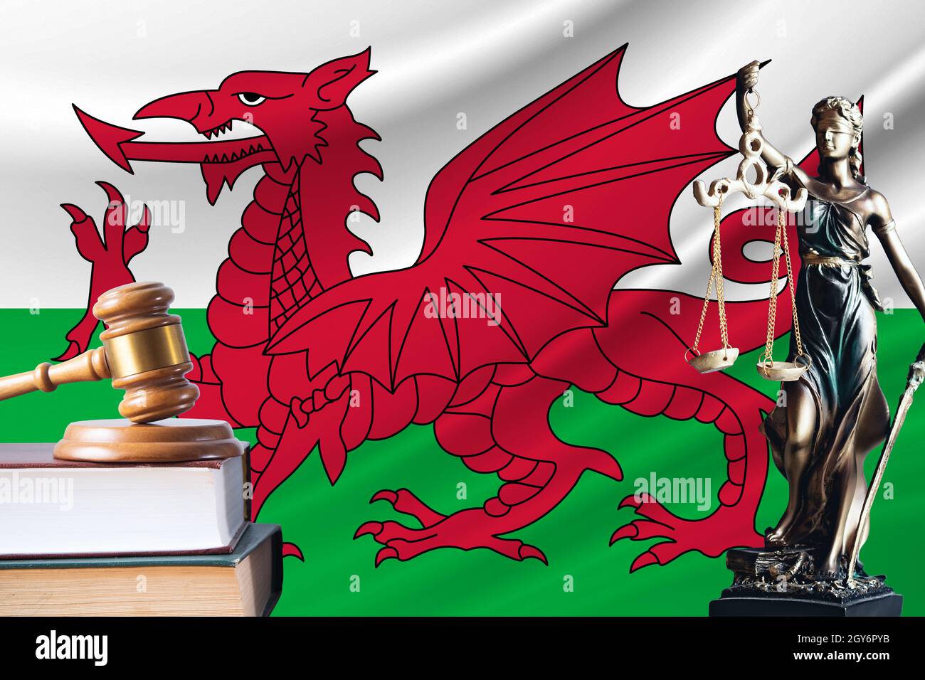 Law and justice in Wales. Statue of themis and the gavel of the judge ...