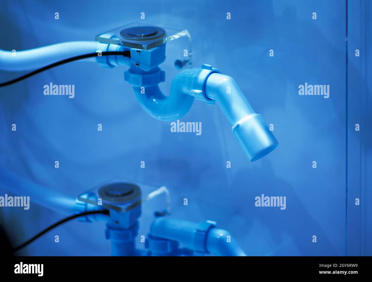 white plastic sewerage water pipes, plumbing smart concept Stock Photo ...