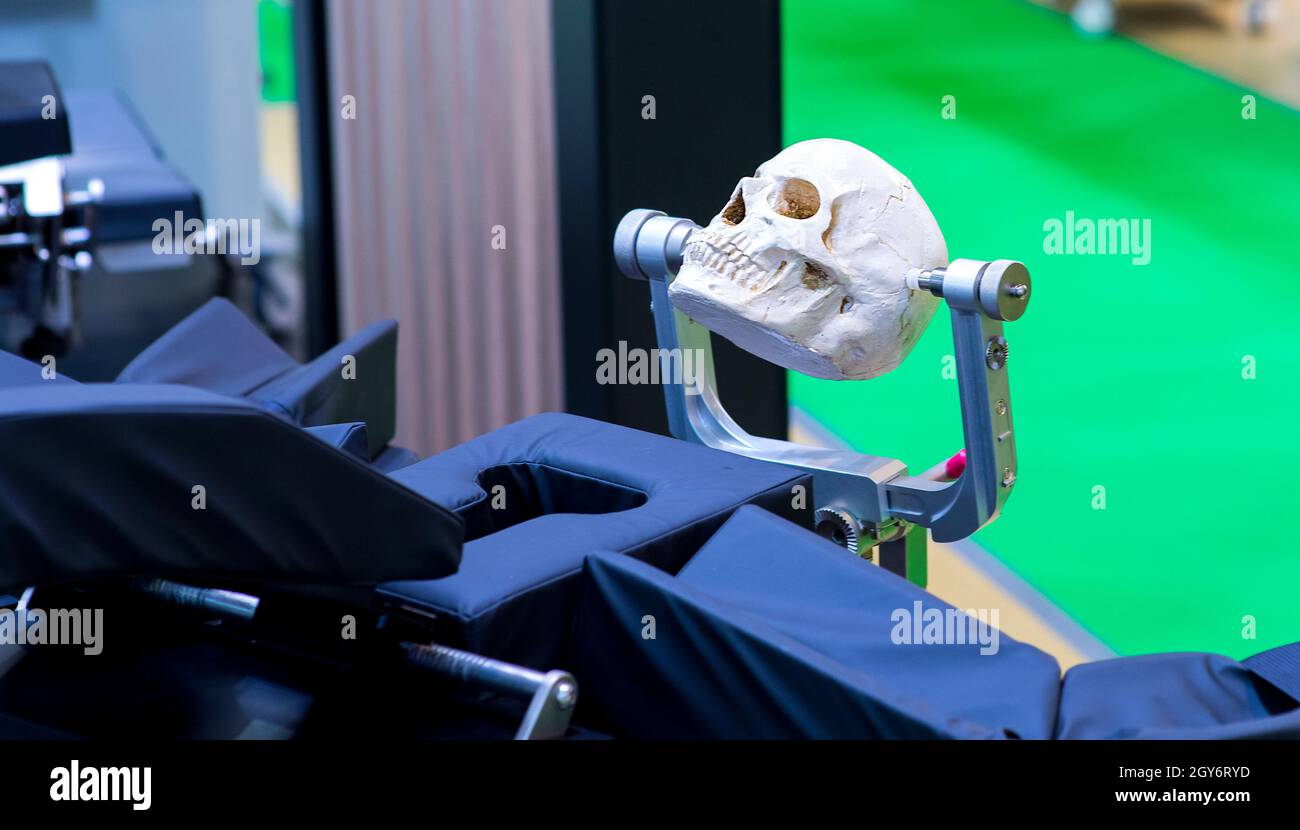 craniotomy chair with artificial skull and instruments Stock Photo - Alamy