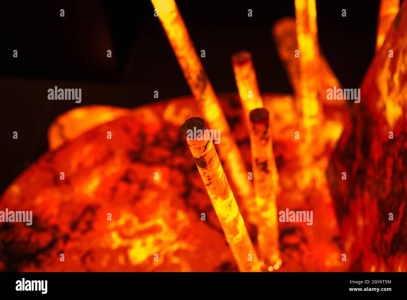 Molten magma hot lava with rods texture Stock Photo - Alamy