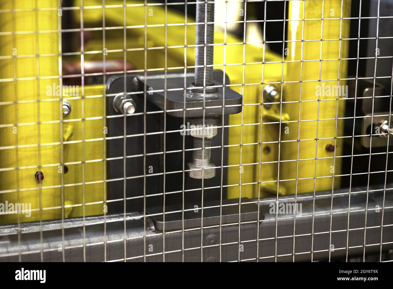 Operator machining automotive part by turning machine Stock Photo - Alamy