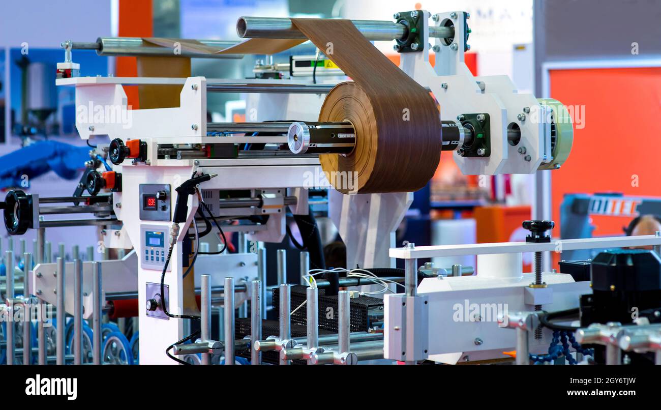 Folding machine industrial. Demonstration of the workflow. Equipment ...