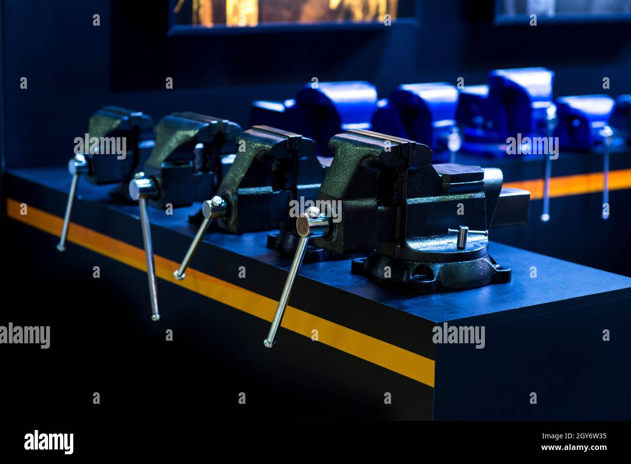 Many Blue Vise on the table, smart manufacturing background ...