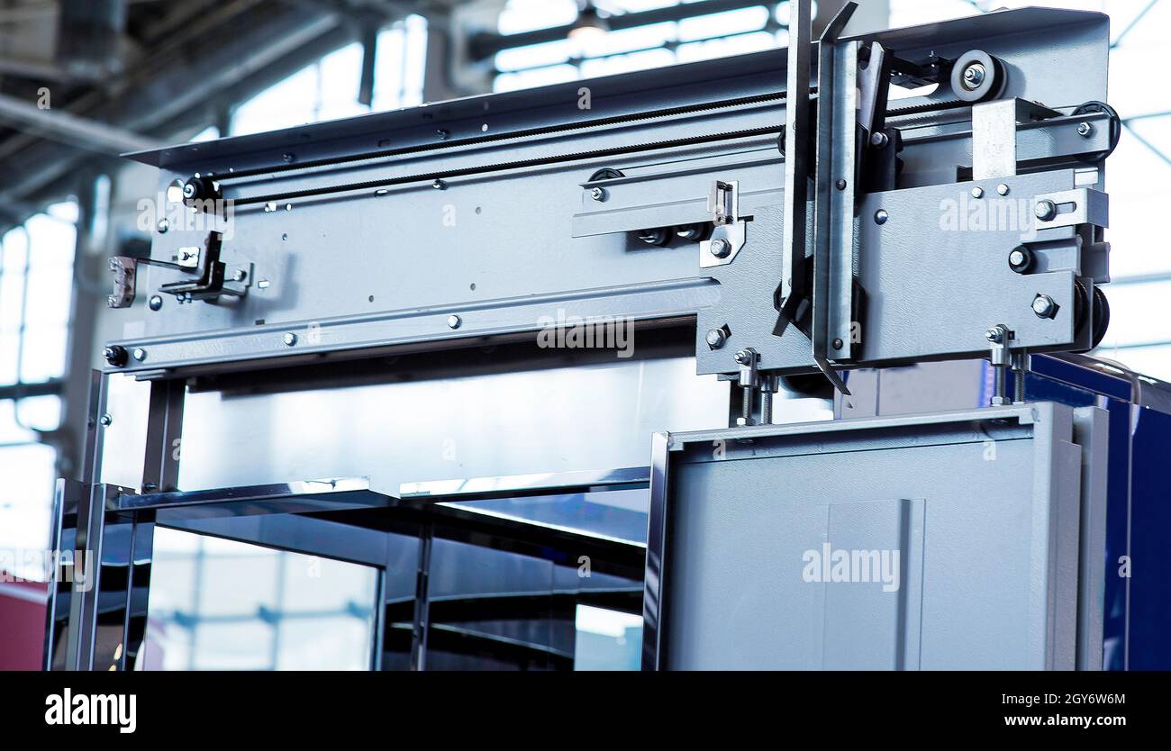 Elevator Installation, Lift Technician Installing a Modern Elevator ...