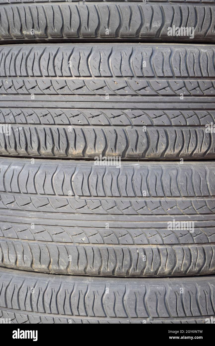 The background of the tread pattern of the car wheel. Rubber tires ...