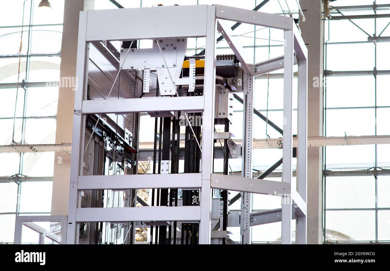 Elevator Installation, Lift Technician Installing a Modern Elevator ...