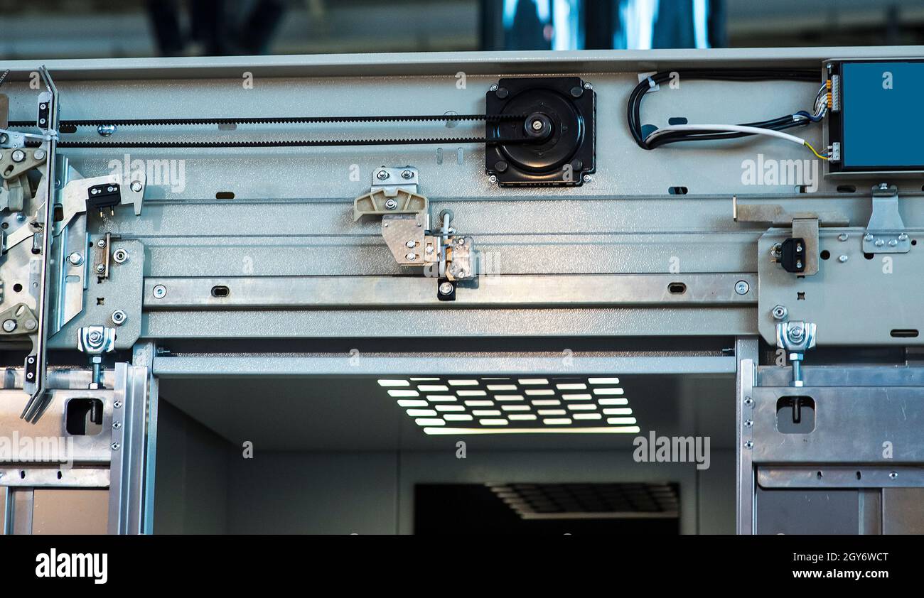 Elevator Installation, Lift Technician Installing a Modern Elevator ...