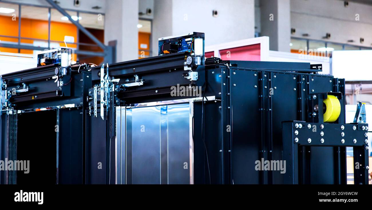 Elevator Installation, Lift Technician Installing a Modern Elevator ...
