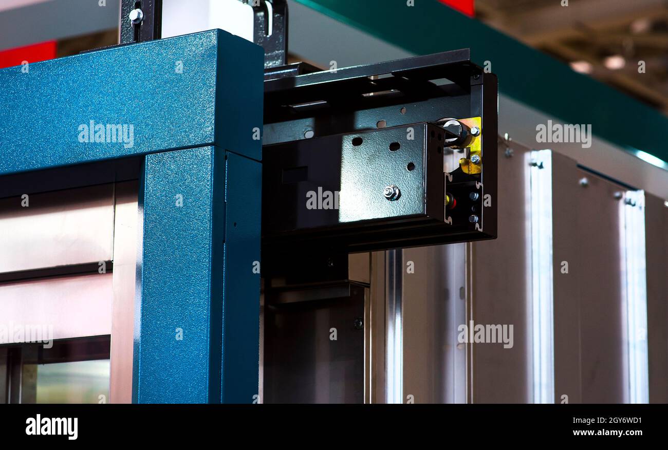 Elevator Installation, Lift Technician Installing a Modern Elevator ...