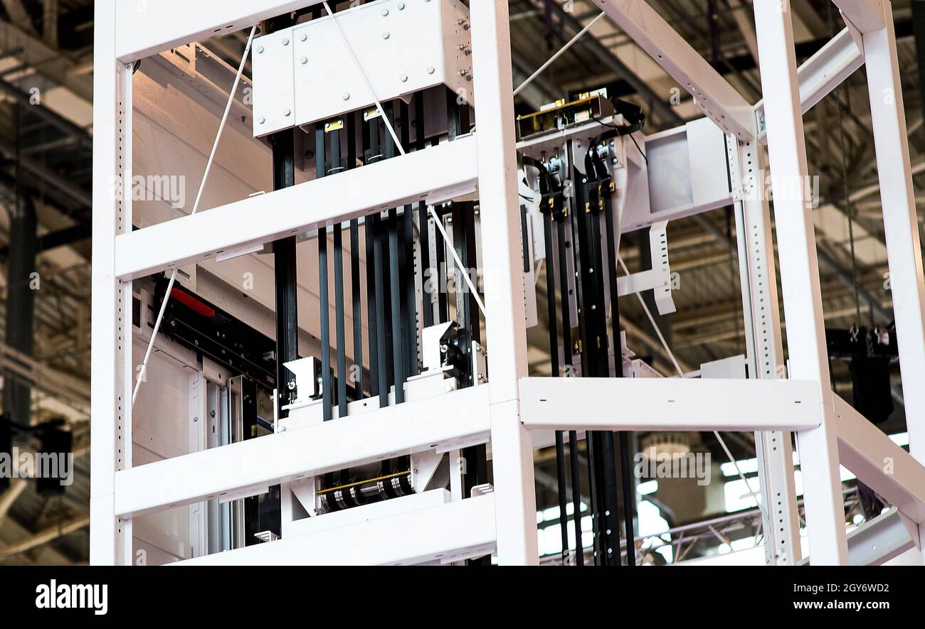Elevator Installation, Lift Technician Installing a Modern Elevator ...