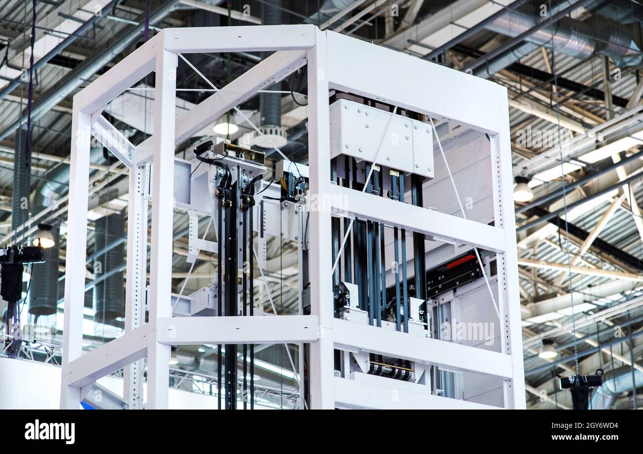 Elevator Installation, Lift Technician Installing a Modern Elevator ...