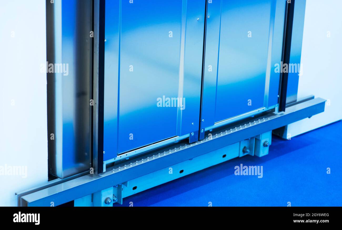 Elevator Installation, Lift Technician Installing a Modern Elevator ...