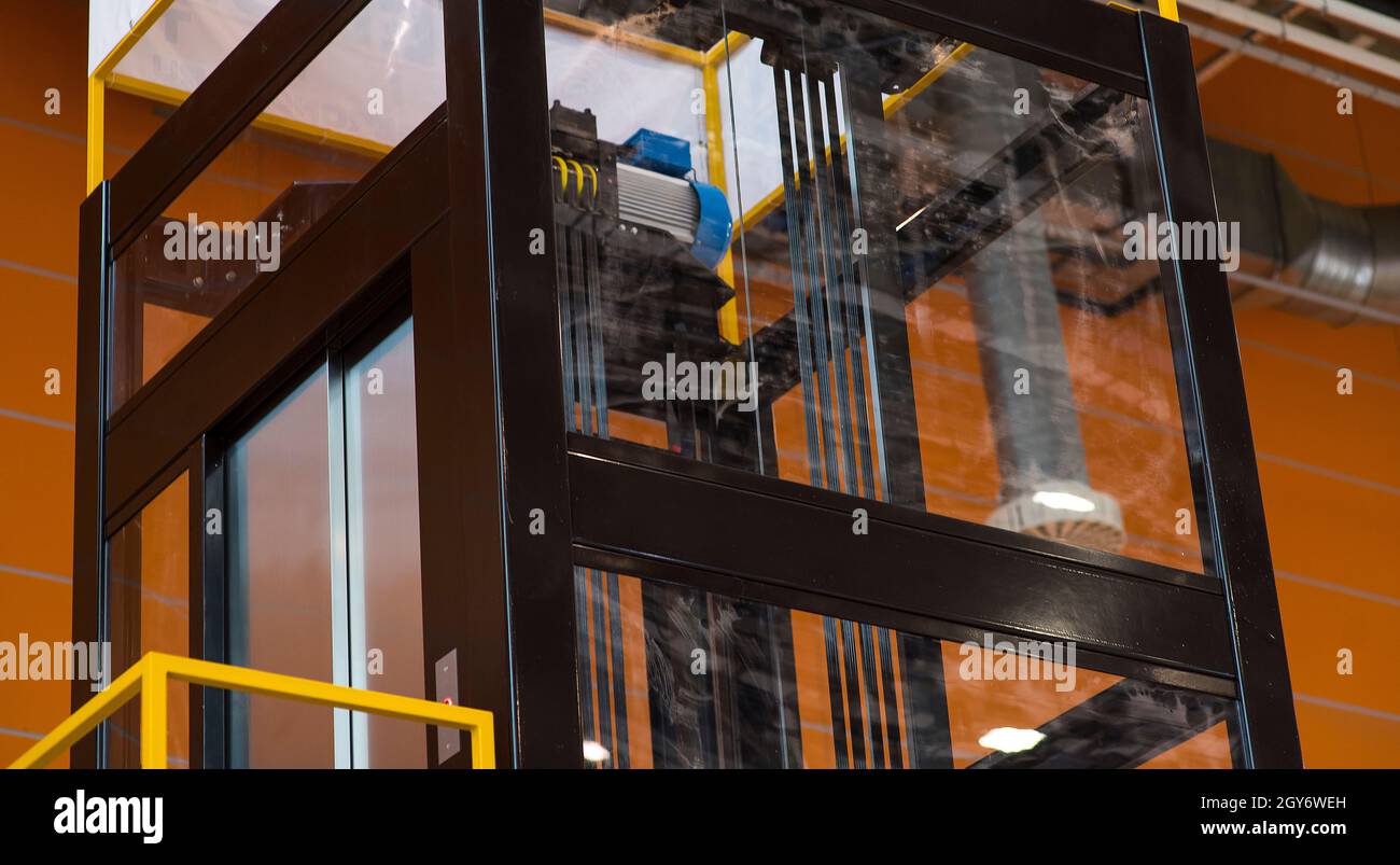 Elevator Installation, Lift Technician Installing a Modern Elevator ...