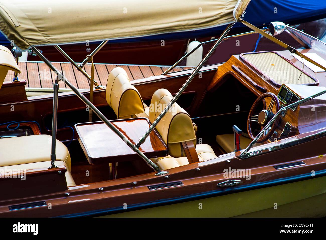luxury boat interior with seats and steering wheel Stock Photo - Alamy