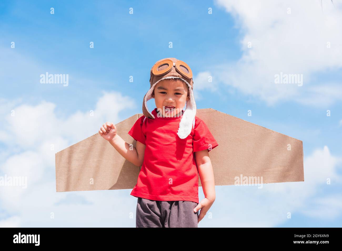 Happy Asian funny child or kid little boy smile wear pilot hat and ...