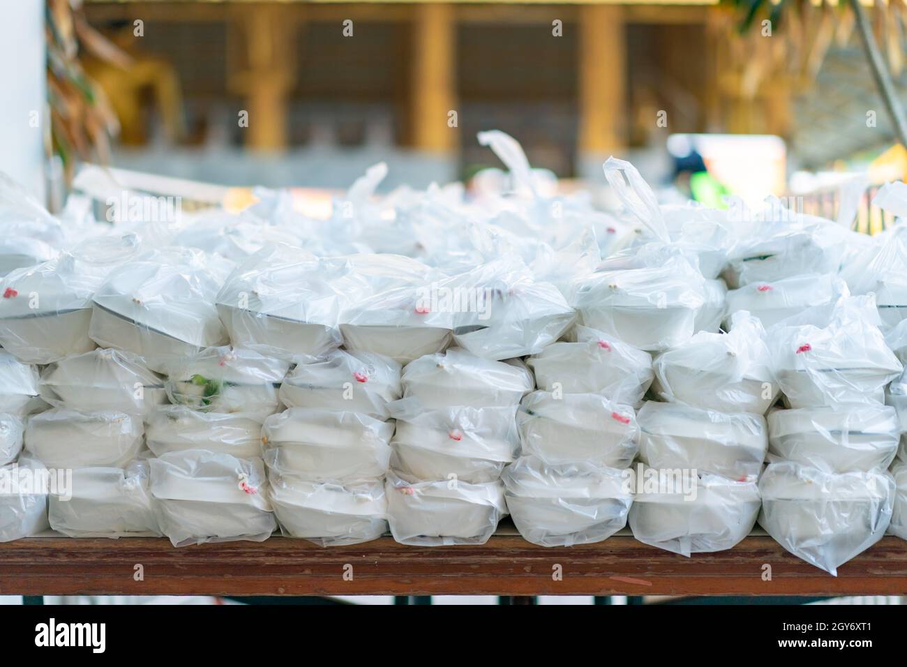 Asian foam food packages are prepare in plastic bag for donation to ...
