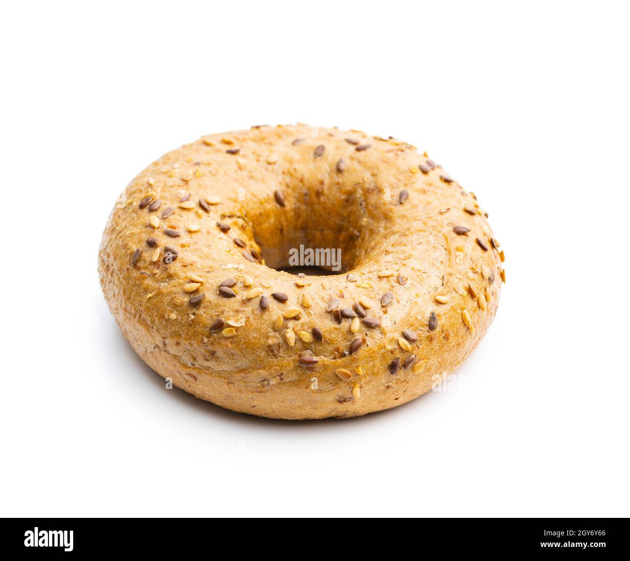 Whole grain baked bagel isolated on white background Stock Photo - Alamy