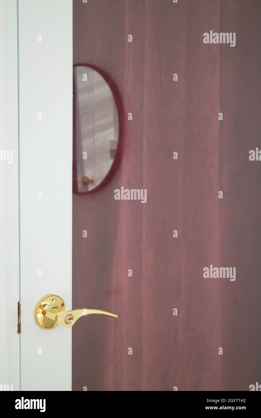 Golden handles on a glass door, stock photo Stock Photo - Alamy