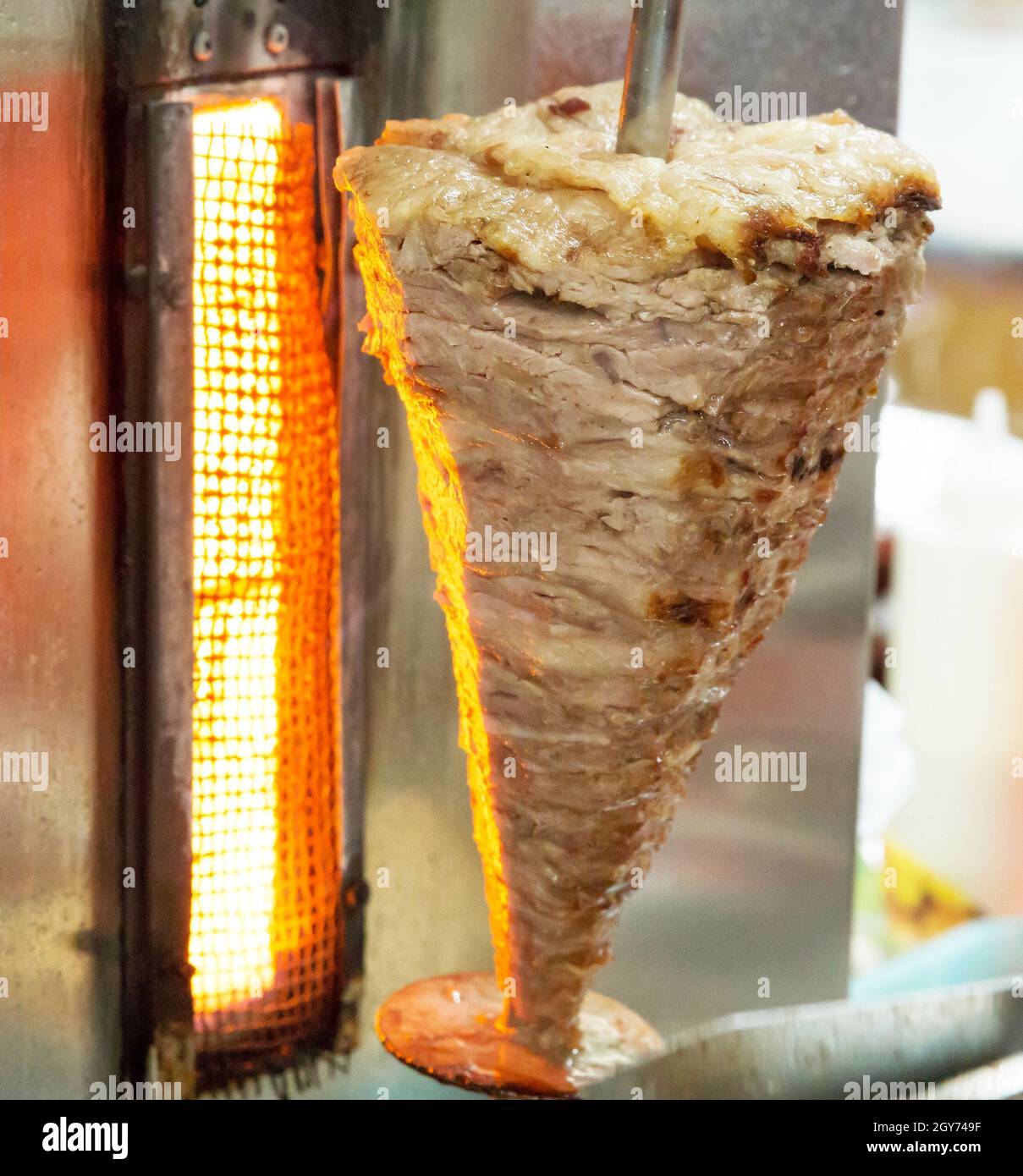 Turkish chicken doner kebab grill on fire Stock Photo - Alamy